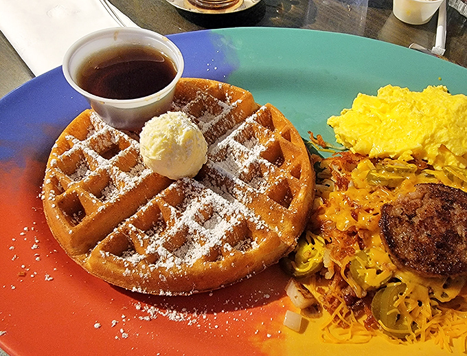 This Belgian waffle doesn't need a passport to transport you to breakfast bliss, especially with that perfect scoop of butter melting into its squares.