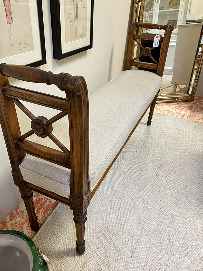 This elegant bench wasn't just made &ndash; it was crafted. Those X-patterns and turned legs speak a design language modern furniture has forgotten.