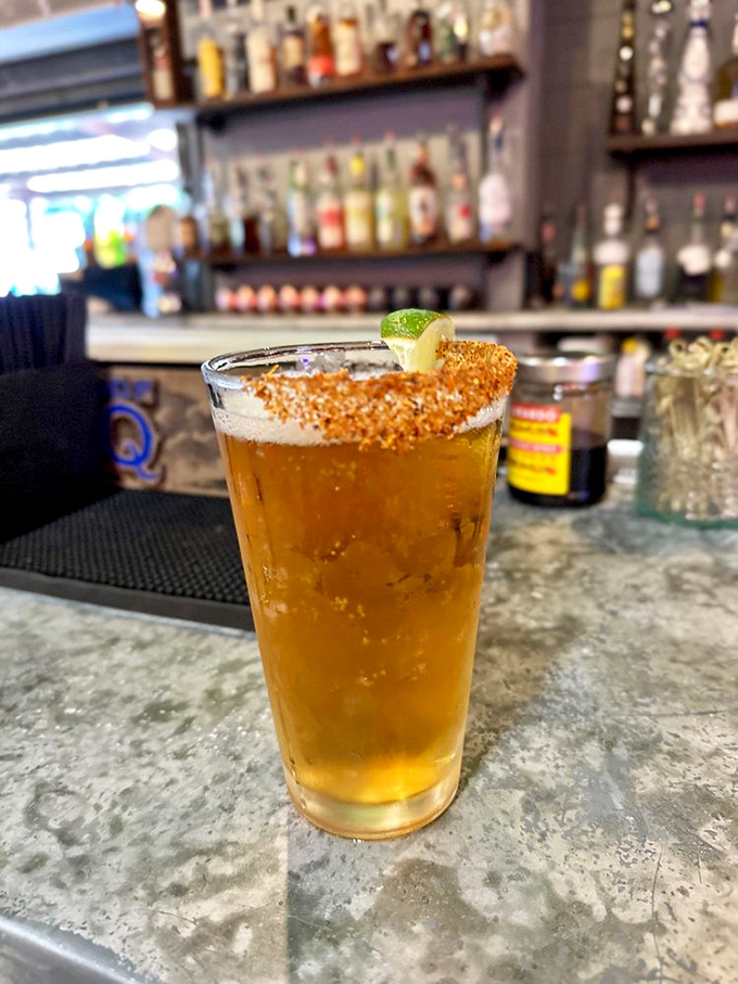 This spice-rimmed beverage isn't just refreshing&mdash;it's the perfect palate companion for a journey through smoke and fire.