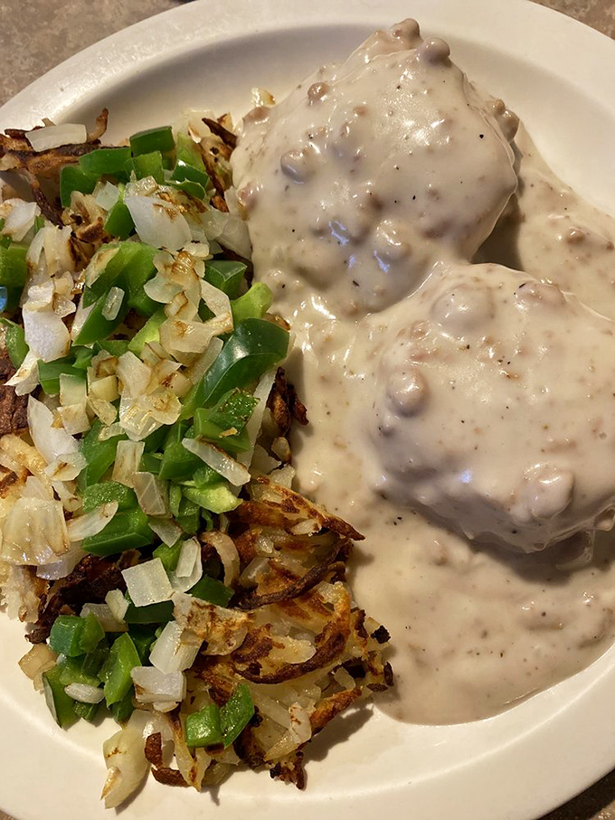 Biscuits and gravy: Southern comfort that found a happy home in Ohio. Those green onions add both color and conscience.