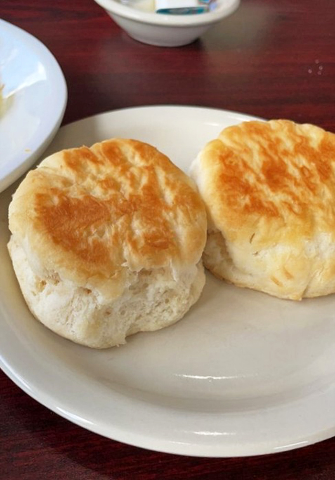 Biscuits so perfectly golden and fluffy they could apply for their own zip code. Southern comfort in carbohydrate form.