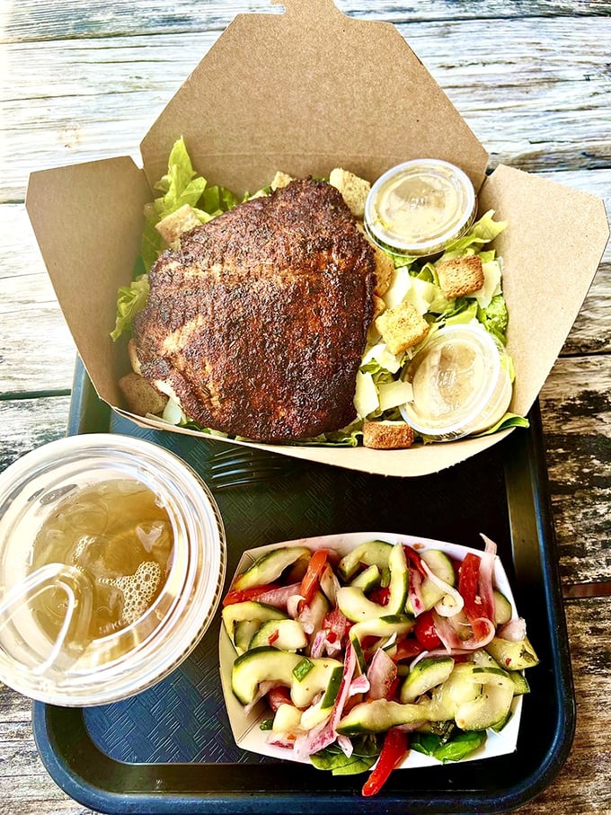 Blackened seasoning meets fresh fish in a marriage of flavors. The accompanying salad provides the perfect counterpoint to the bold spices.