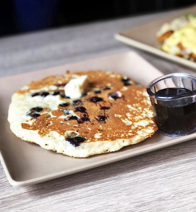 Blueberry pancakes that taste like summer vacation memories&mdash;light, fluffy, and dotted with berries that pop with each bite.