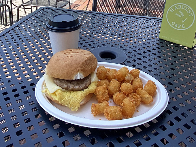 Breakfast sandwich perfection with a side of golden tots. This plate doesn't just say good morning&mdash;it shouts "TODAY WILL BE AMAZING!"