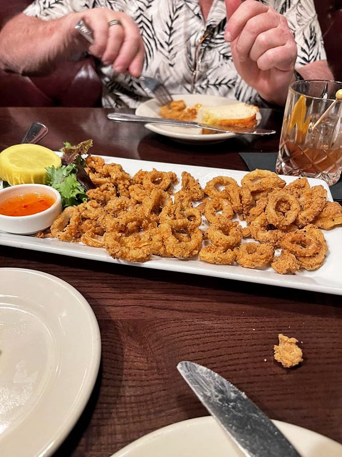 Calamari so perfectly crisp you'll forget you once called them "rubber bands with marinara." A masterclass in seafood preparation.