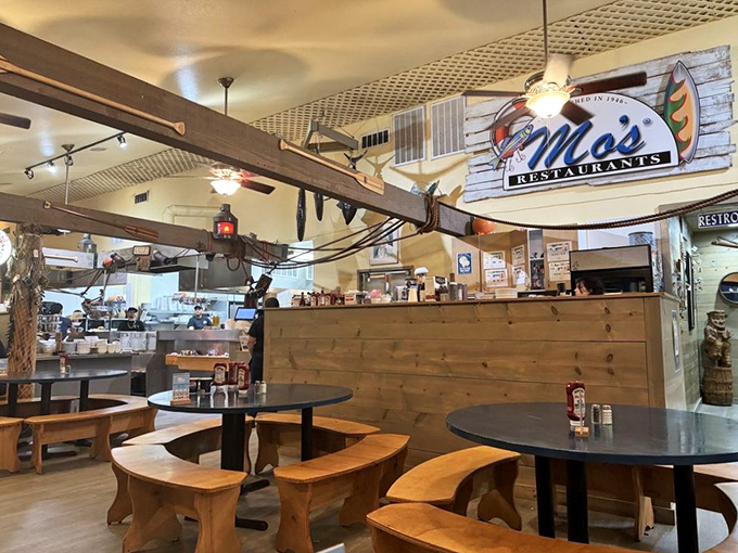 Where the magic happens&mdash;Mo's open kitchen and order counter. The wooden paneling and nautical decor remind you that seafood this fresh deserves a proper coastal setting.