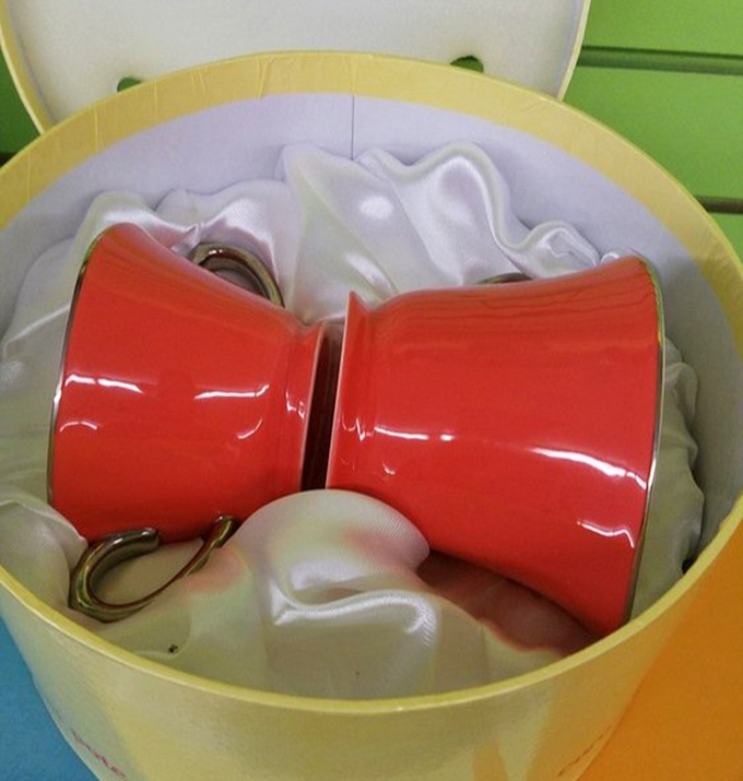 Those cheerful red mugs aren't just containers for coffee&mdash;they're future vessels for morning inspiration at a fraction of retail prices.