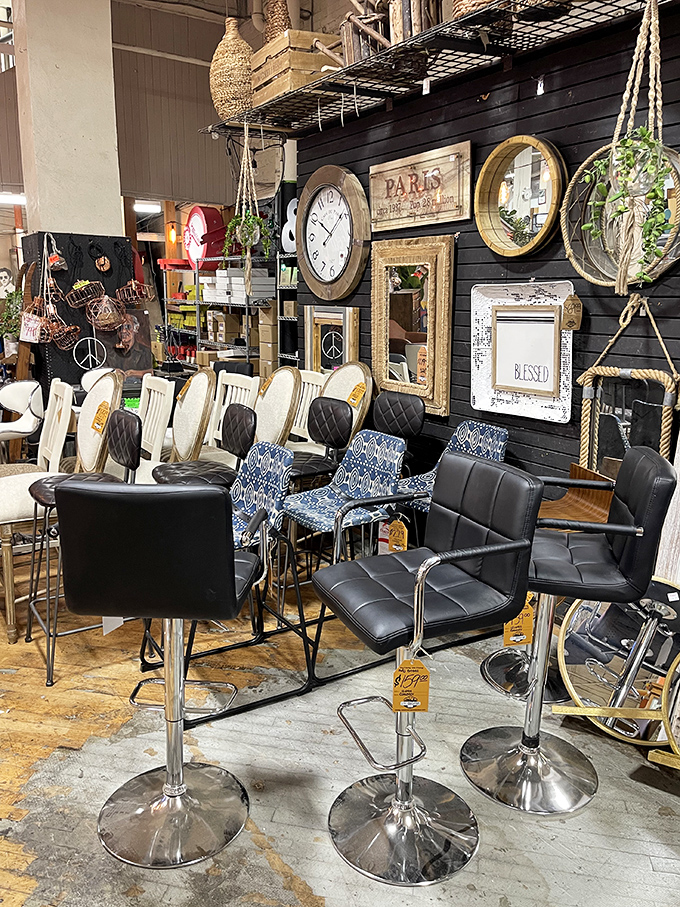 Bar stools line up like chrome soldiers, ready to elevate your kitchen island conversations to new heights.