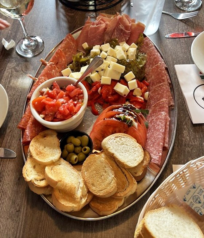 The antipasto board that launches a thousand conversations &ndash; a delicious spread that encourages lingering, sharing, and "just one more bite."