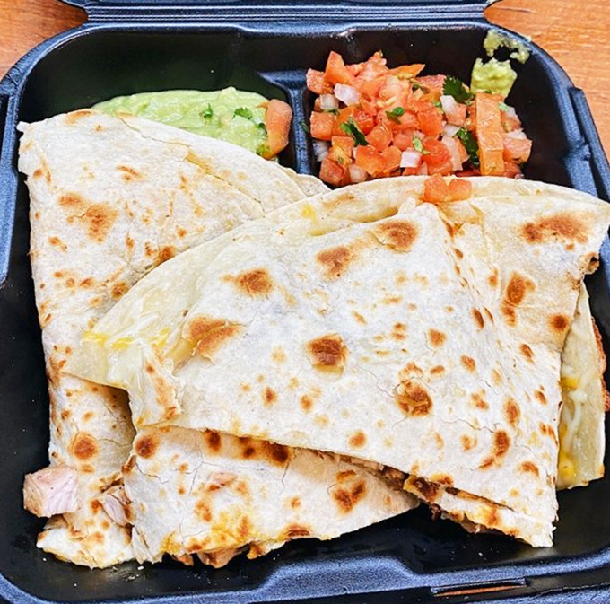 Quesadillas so perfectly grilled they deserve their own Instagram account. That golden-brown tortilla is hiding a treasure chest of melted cheese.