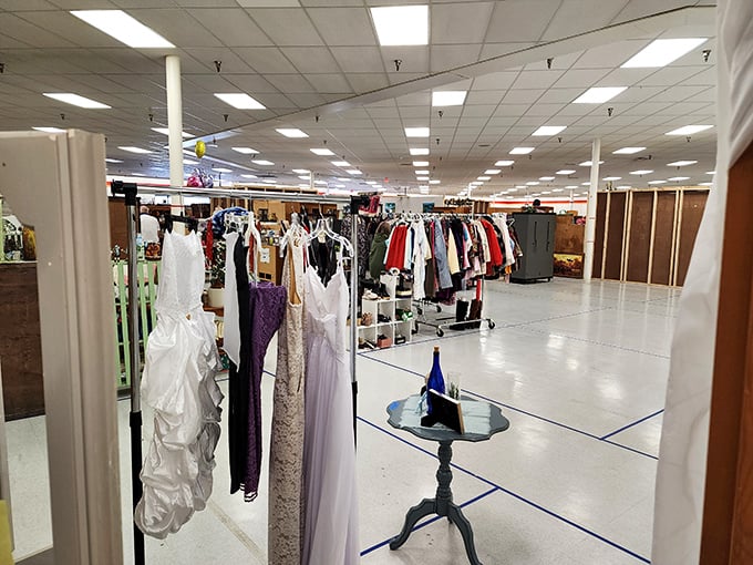 Wedding dresses with histories unknown, waiting for new life. Perhaps as a Halloween costume or theater production?