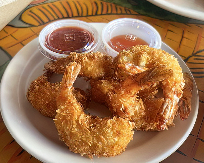 Coconut shrimp: where tropical vacation meets comfort food. The crispy exterior gives way to succulent shrimp that transports you to island time.