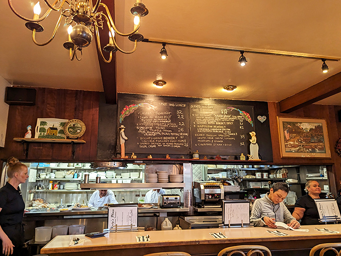 Where breakfast magic happens &ndash; the open kitchen and counter seating let you witness the choreographed dance of morning meal preparation.