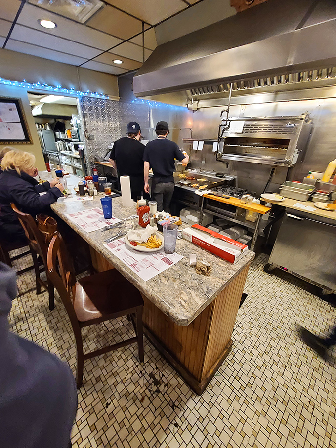 Where breakfast magic happens &ndash; the open kitchen design lets you witness the choreographed dance of short-order cooking that transforms simple ingredients into morning masterpieces.