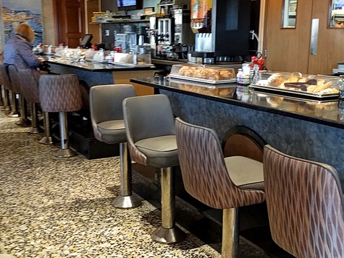 Counter culture at its finest&mdash;where early birds perch with coffee and pastries, watching the morning unfold in delicious real-time.
