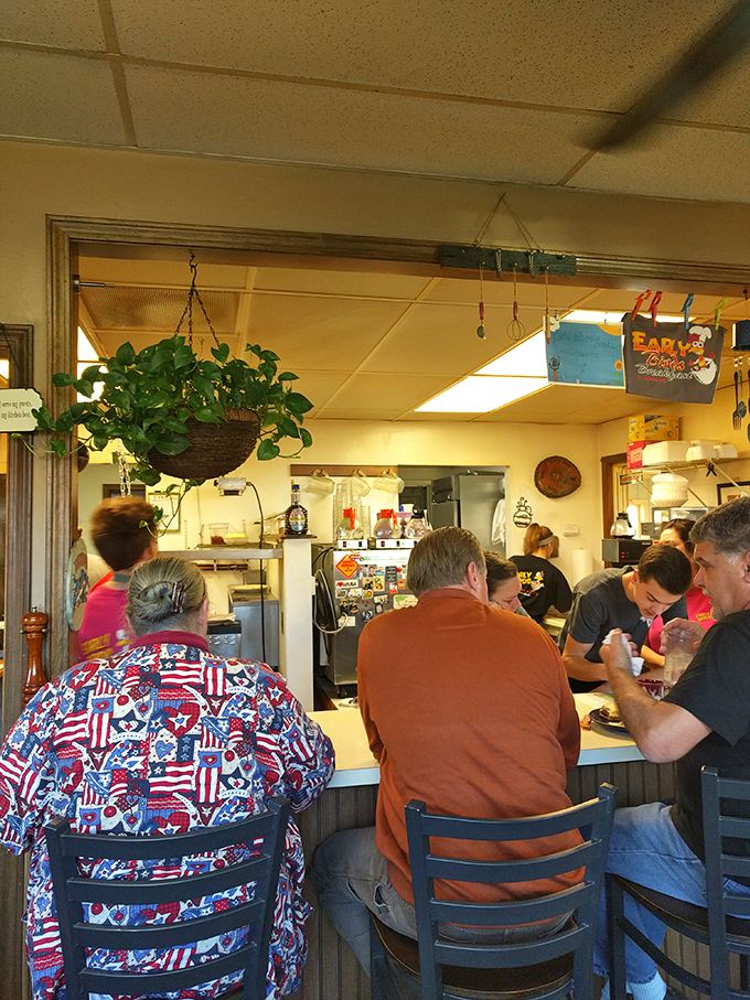 Counter seating: where strangers become friends over coffee refills and shared appreciation for properly cooked breakfast meats.