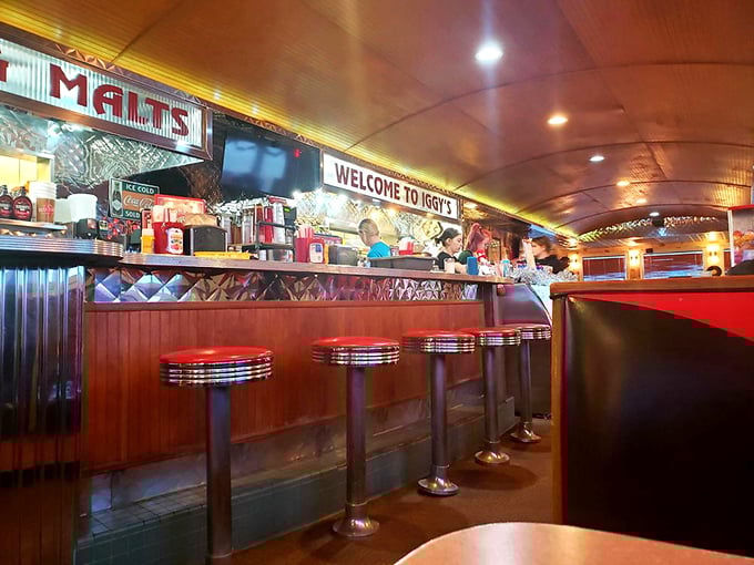 Counter seating: where diner magic happens at close range. Those red stools have witnessed more food joy than most therapists have heard problems.