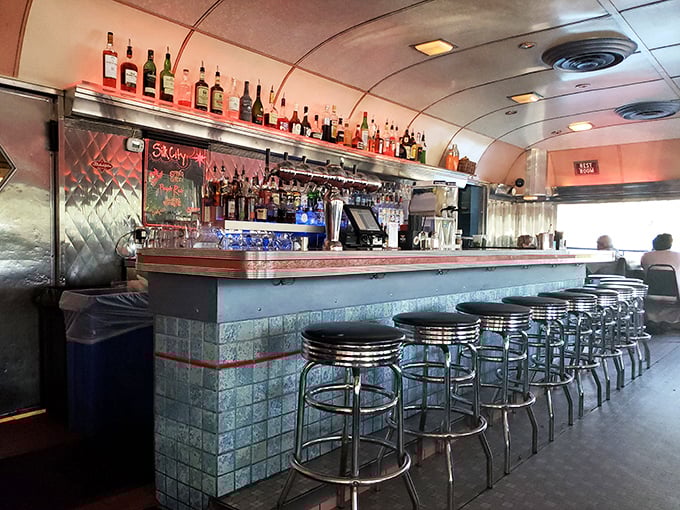 Counter seating: where solo diners become temporary neighbors and the bartender knows exactly when you need a coffee refill.