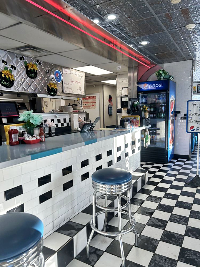 The counter seating offers front-row tickets to the short-order cooking show. Those classic chrome stools have supported generations of satisfied diners.