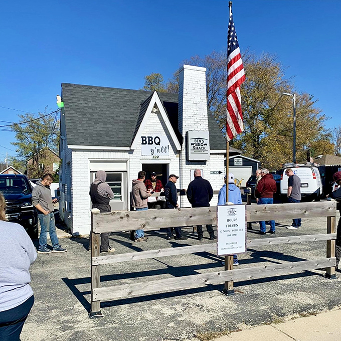 The line forms early at Ben's&mdash;a testament to barbecue worth waiting for. That American flag adds a perfect touch of heartland pride.