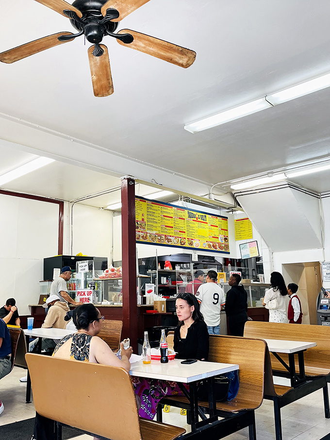 The dining room hums with the universal language of good food, where strangers become comrades united by their quest for the perfect bite.