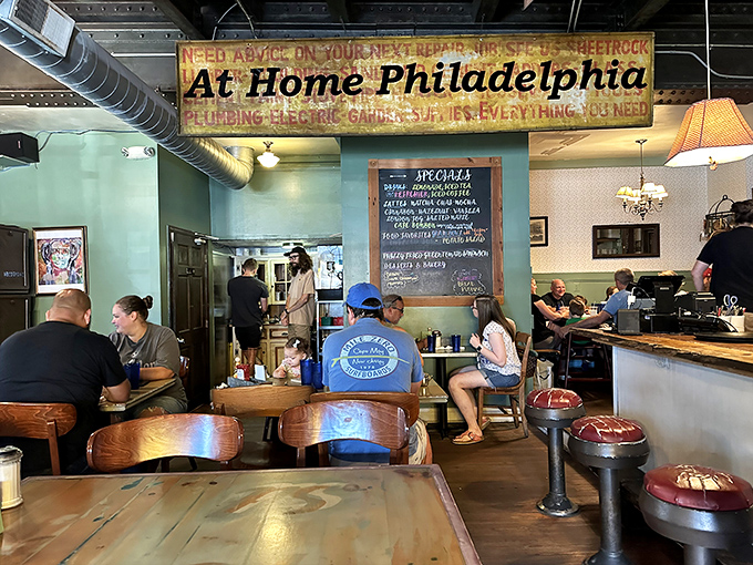 The "At Home Philadelphia" sign says it all&mdash;this isn't just a restaurant, it's where locals come to feel like they never left their kitchen.