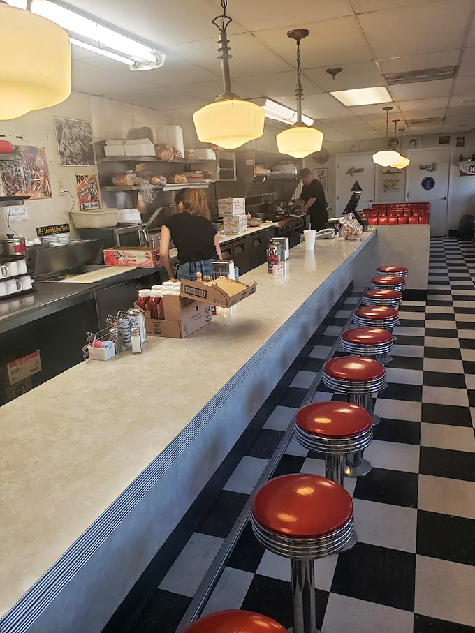 Those red counter stools aren't just seating&mdash;they're front-row tickets to the greatest show in town: breakfast being made right.
