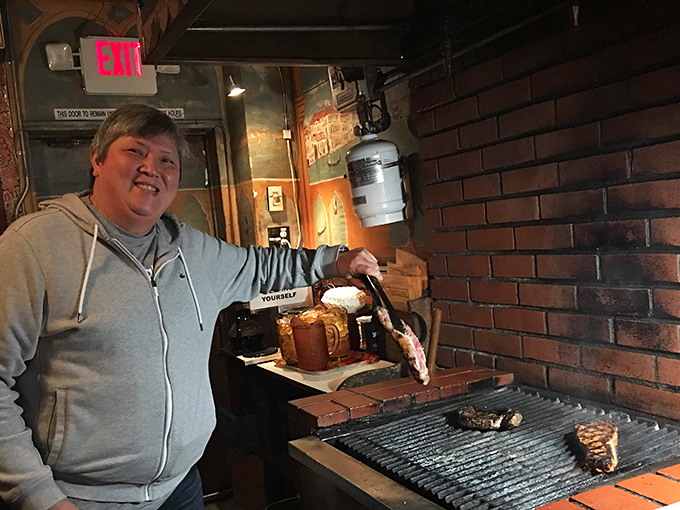 The look of pride when you've mastered the grill – a rite of passage that turns dinner into an achievement.