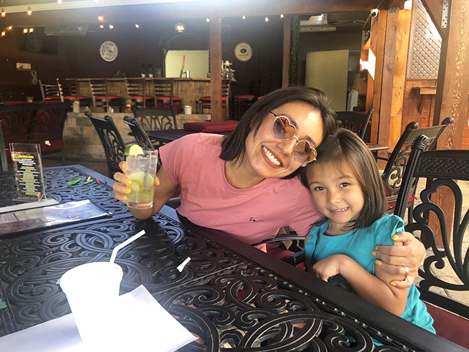 Happy diners enjoying the outdoor seating area, where memories are made between sips and smiles. The perfect setting for family moments that become favorite stories.