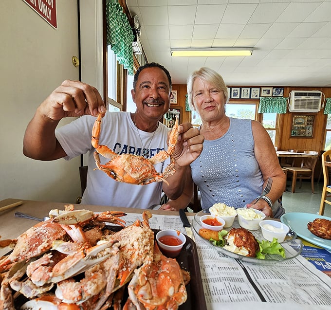 The universal language of crab joy written on happy faces. That triumphant claw-holding pose is the Delaware equivalent of a trophy photo.