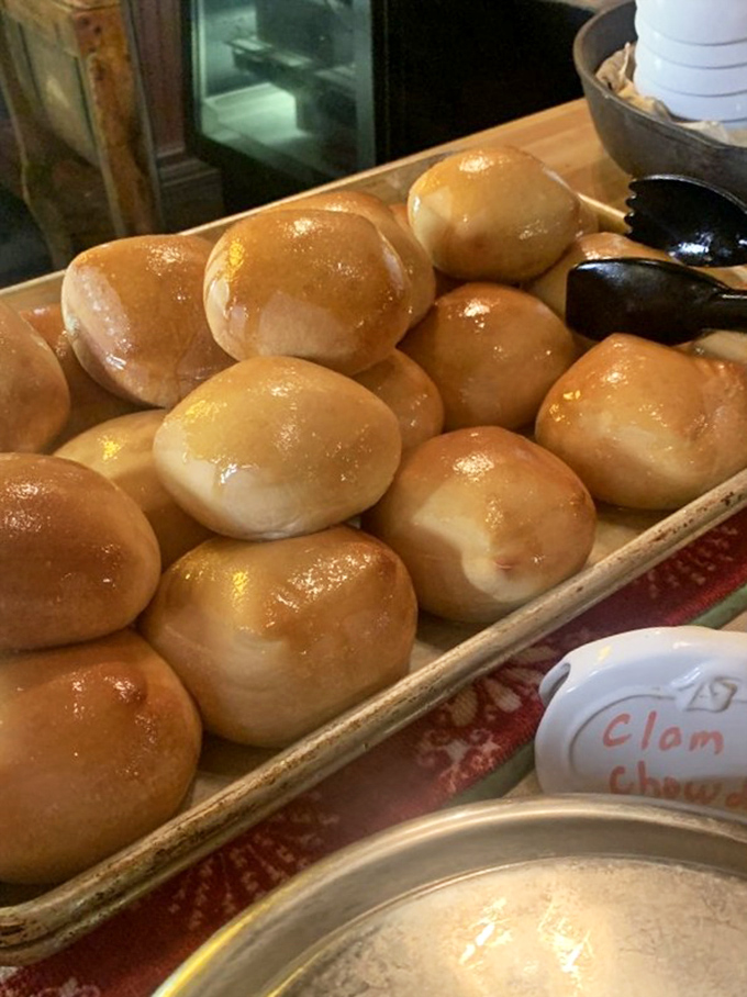 Fresh dinner rolls that shine like golden promises of the comfort food feast to come.