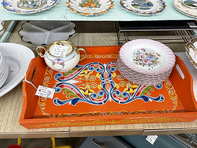 That vibrant orange hand-painted tray could make even a mundane breakfast feel like dining in a European café.