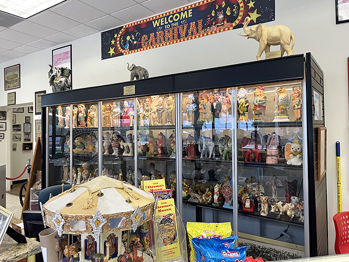 This display case holds miniature memories of when carnivals were the biggest entertainment events in small towns.