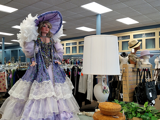 Another elaborate doll holds court in purple majesty. She's not just wearing a dress&mdash;she's wearing an entire royal backstory.