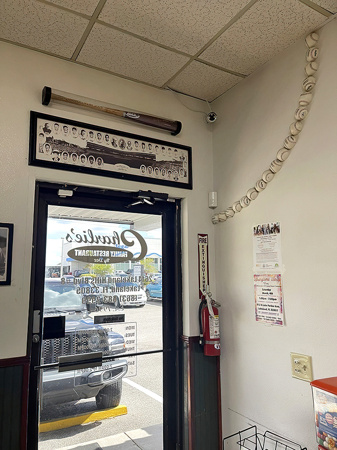The entrance to Charlie's features baseball memorabilia – a reminder that America's pastime and comfort food share the same nostalgic heart.