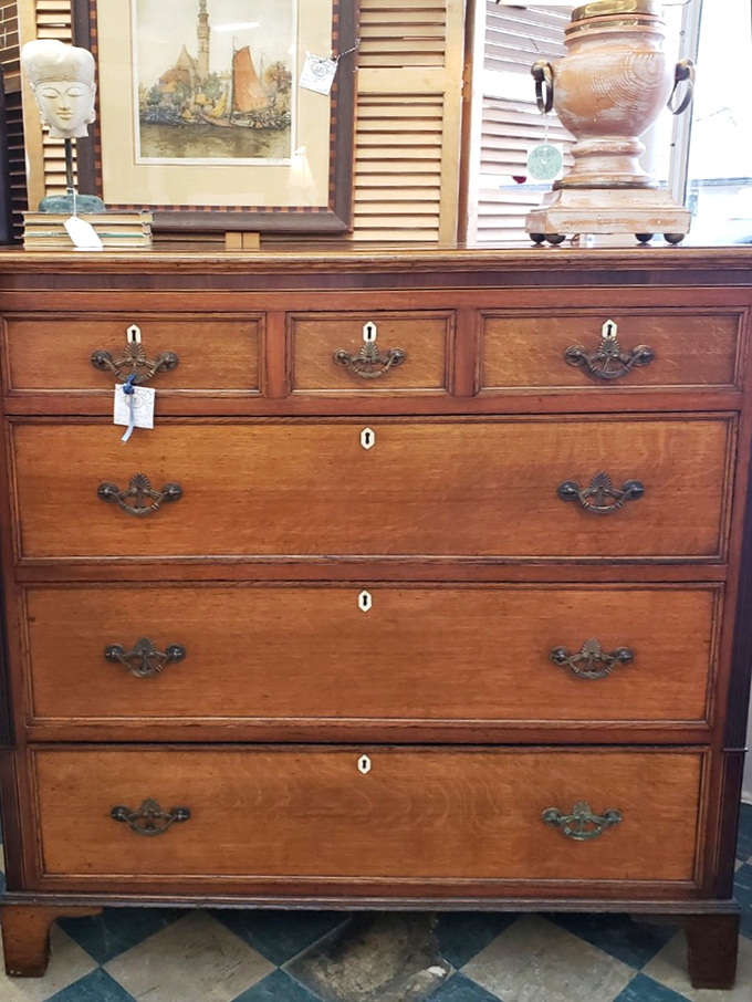 This solid oak dresser has survived longer than most marriages, with drawers that have held everything from love letters to bell-bottom jeans.