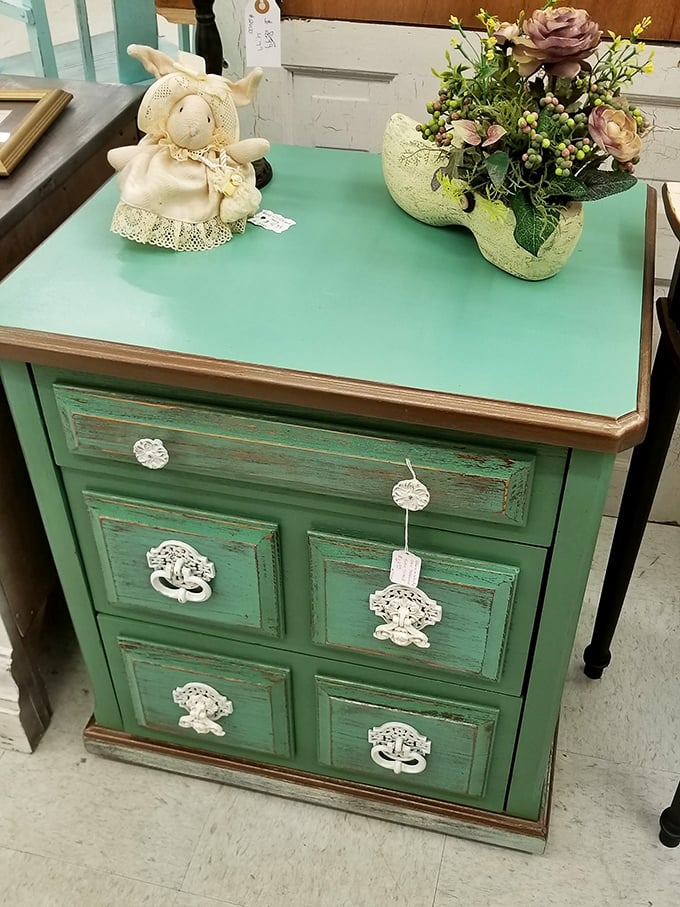 Mint-green charm with vintage hardware. This distressed dresser offers the perfect balance of character and function&mdash;shabby chic before it became a Pinterest category.
