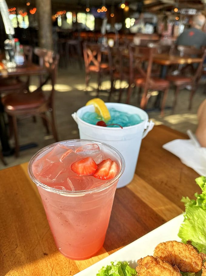 Cocktails that match the view&mdash;vibrant, refreshing, and making you forget you have responsibilities back home. That blue drink is basically liquid vacation.