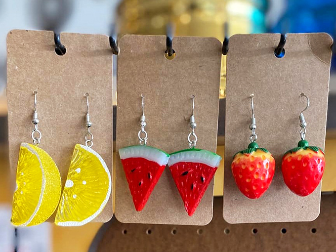 Fruit-shaped earrings that bring playful summer energy to any outfit, proving accessories don't need diamonds to make a delicious statement.