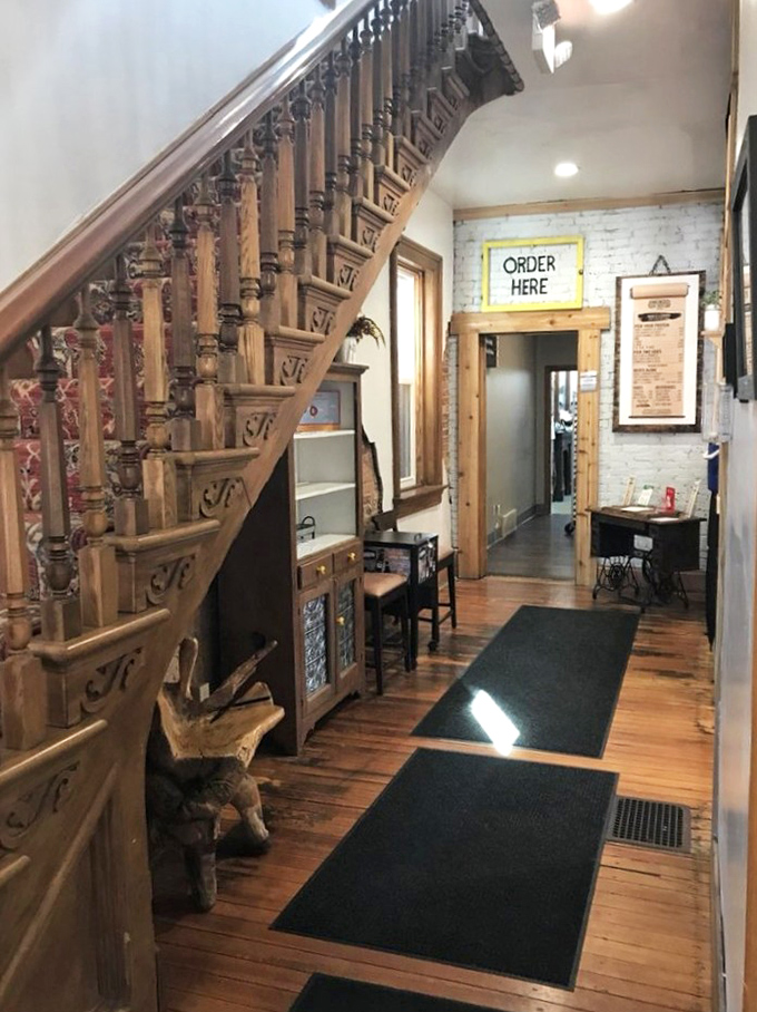 The grand staircase welcomes you like an old friend inviting you to discover something truly special upstairs.