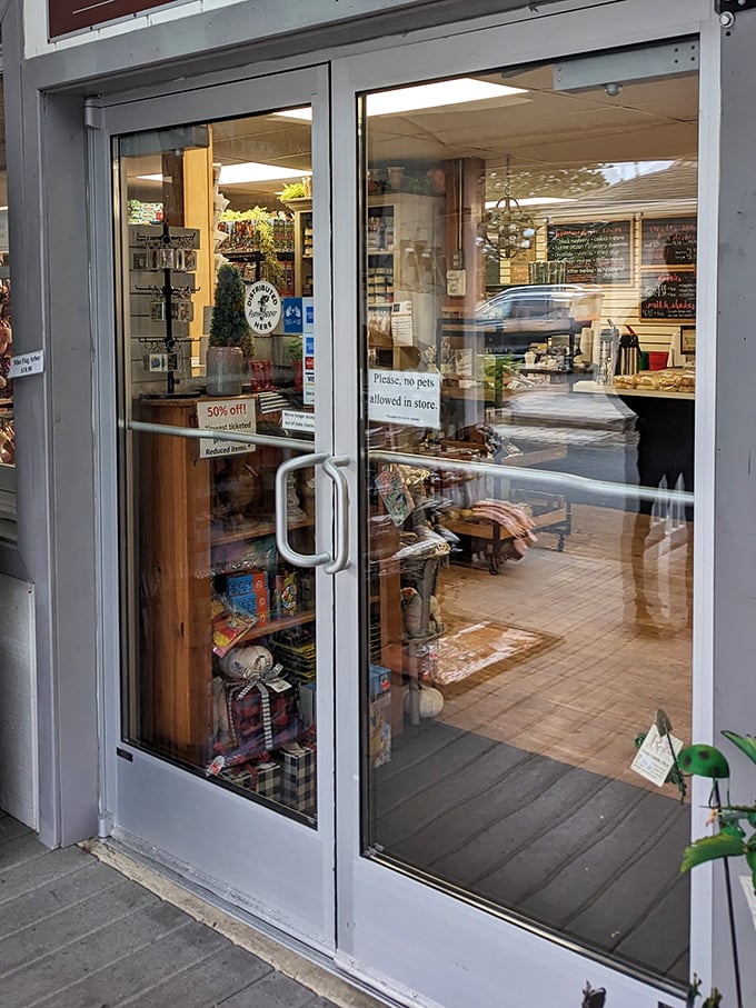 The entrance promises treasures beyond the glass. Like a portal to a world where calories don't count and joy is measured in pastry.