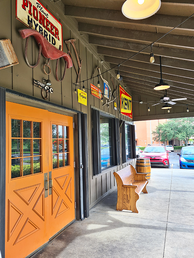 That bright orange door isn't just an entrance – it's a portal to a world where comfort food reigns supreme.
