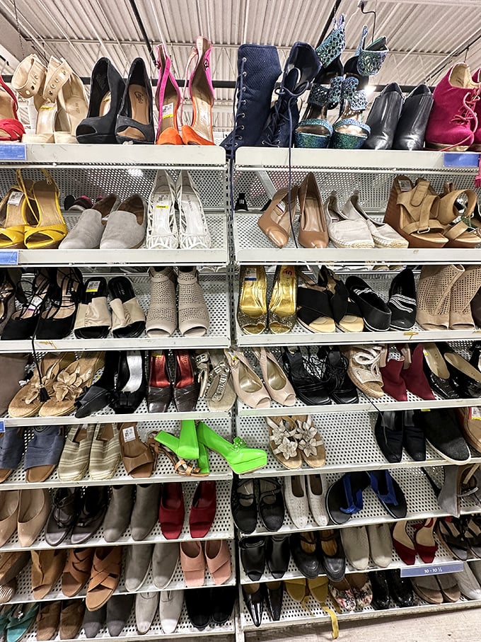 Shoe shelves tell stories of proms, weddings, and office jobs past. Those lime green platforms? Someone's fashion mistake becomes your Halloween costume gold.