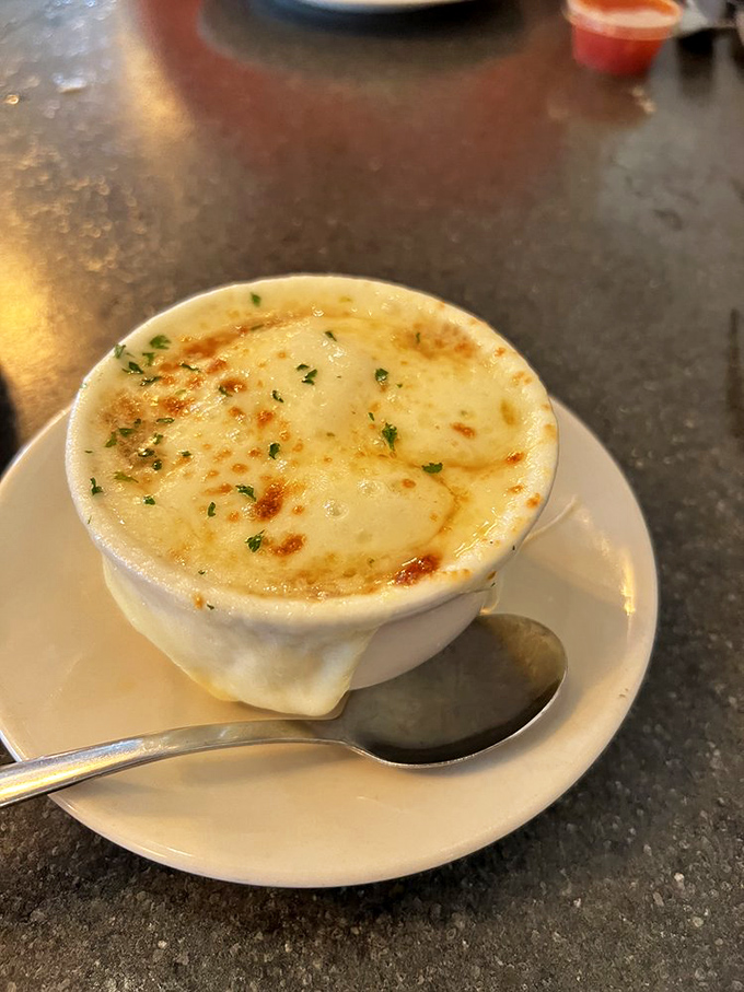 French onion soup that's achieved the perfect cheese-pull-to-broth ratio&mdash;a bubbling masterpiece that's worth the inevitable chin dribble.