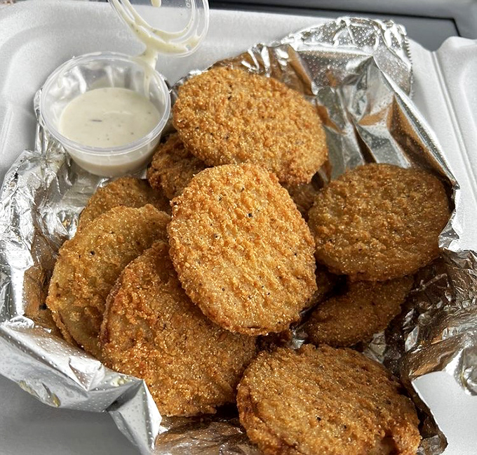 Fried green tomatoes with a golden crust that shatters just right&mdash;tangy treasures that make you wonder why green tomatoes ever bother ripening.