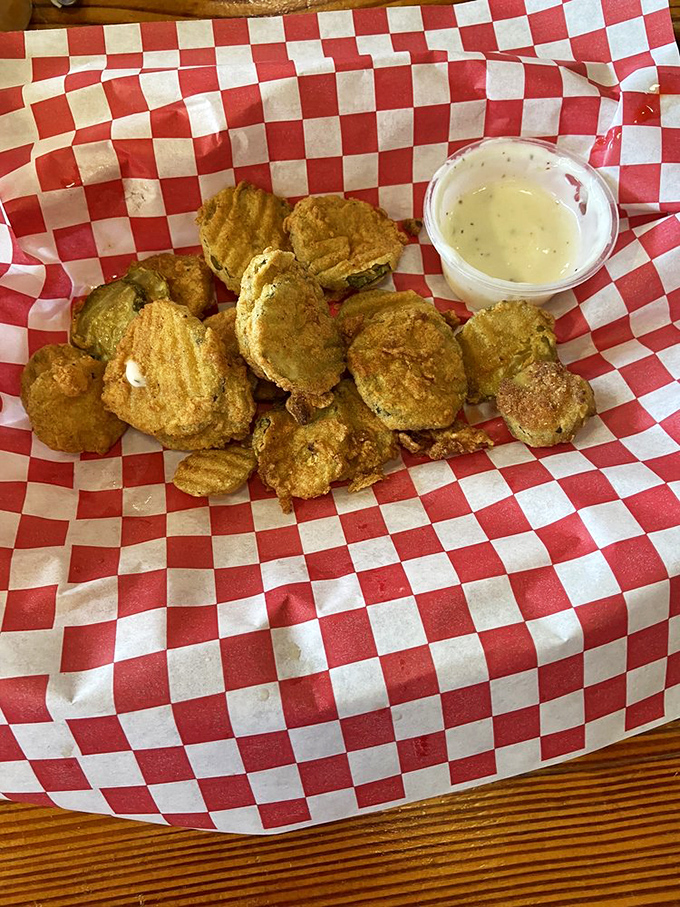 Fried pickles &ndash; where tangy meets crispy in a Southern appetizer that's converted more Yankees to Southern cuisine than sweet tea.
