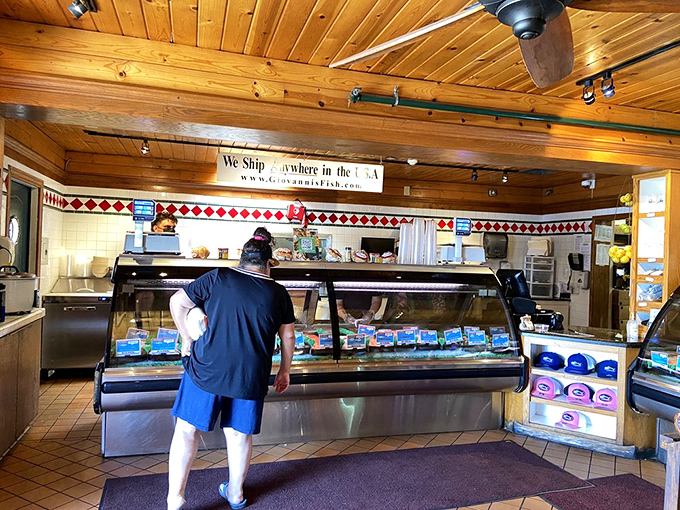 The fish counter&mdash;where dreams and dinner plans converge. "We ship anywhere in the USA" isn't just a sign&mdash;it's a promise of seafood democracy.