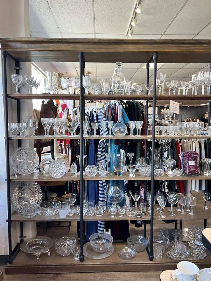 A forest of crystal stemware catches the light, each piece waiting to elevate someone's dinner party from "Tuesday night" to "special occasion."