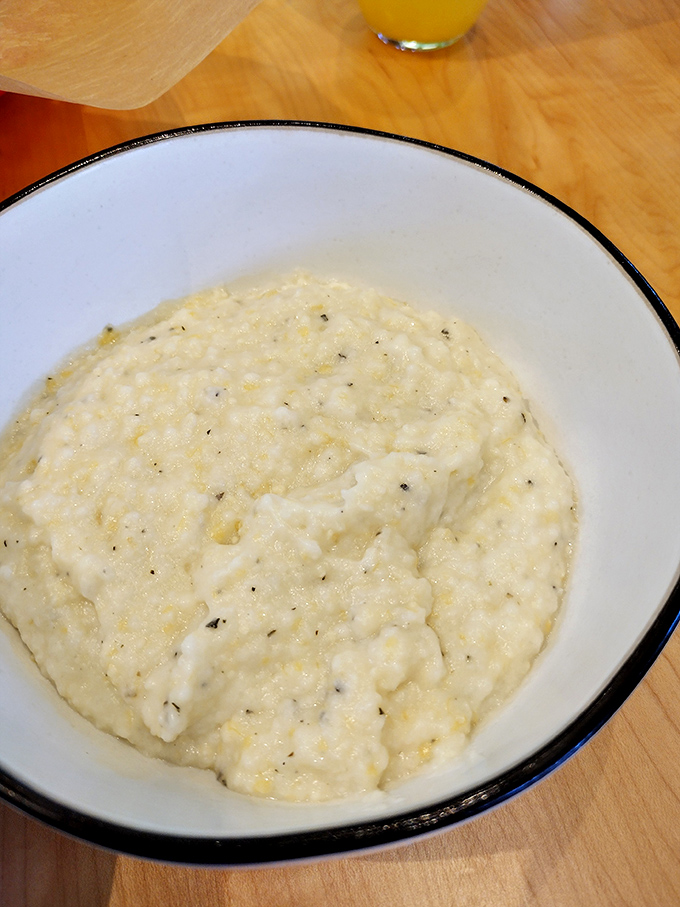 These aren't your grandma's grits – unless your grandma was a culinary genius who understood the power of perfect creaminess.