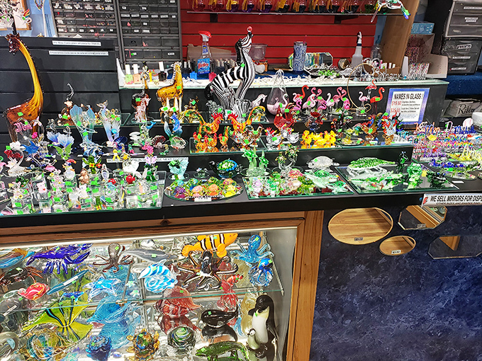 A kaleidoscope of handcrafted glass figurines catches the light. Each delicate piece represents hours of artistry and patience&mdash;no two exactly alike.